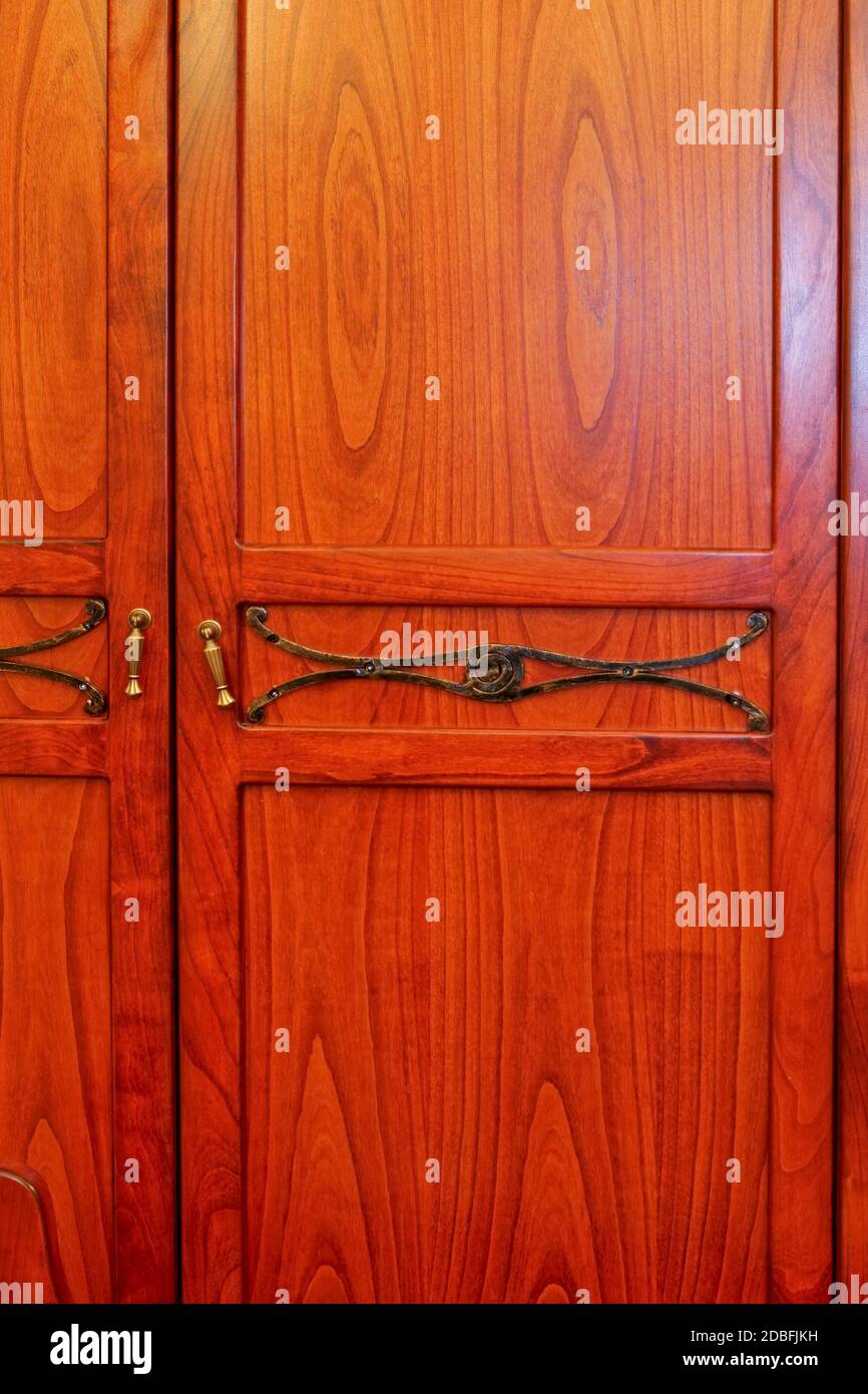 Wooden pattern cabinet with iron metal decoration Stock Photo - Alamy