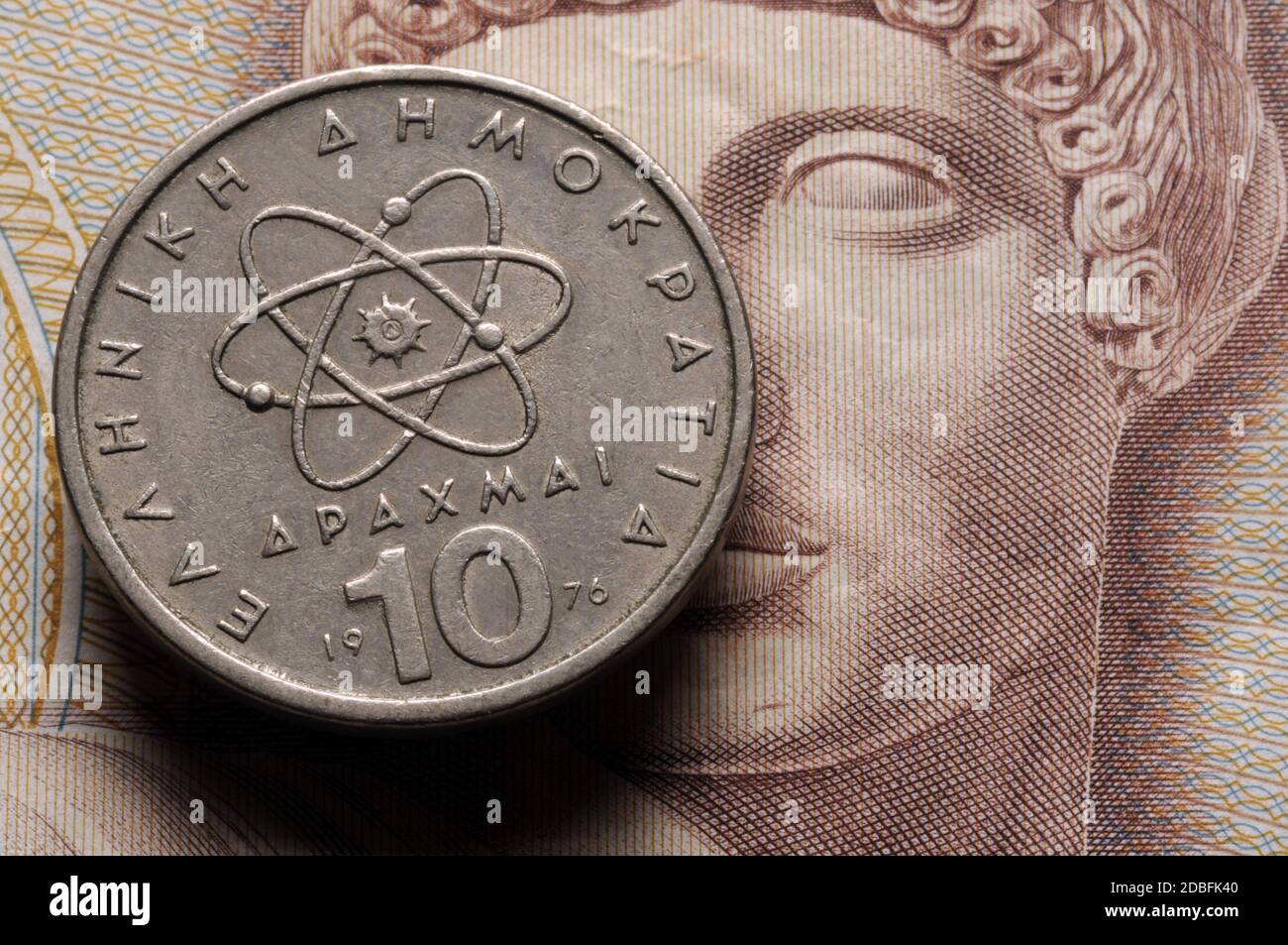 Greek drachma coin on banknote Stock Photo - Alamy