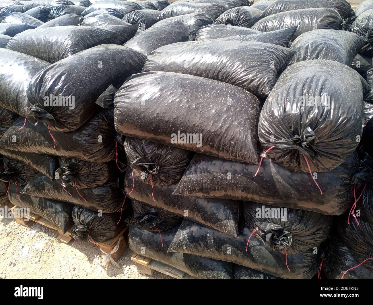 Packages with rubble and sand on the construction site. Building ...