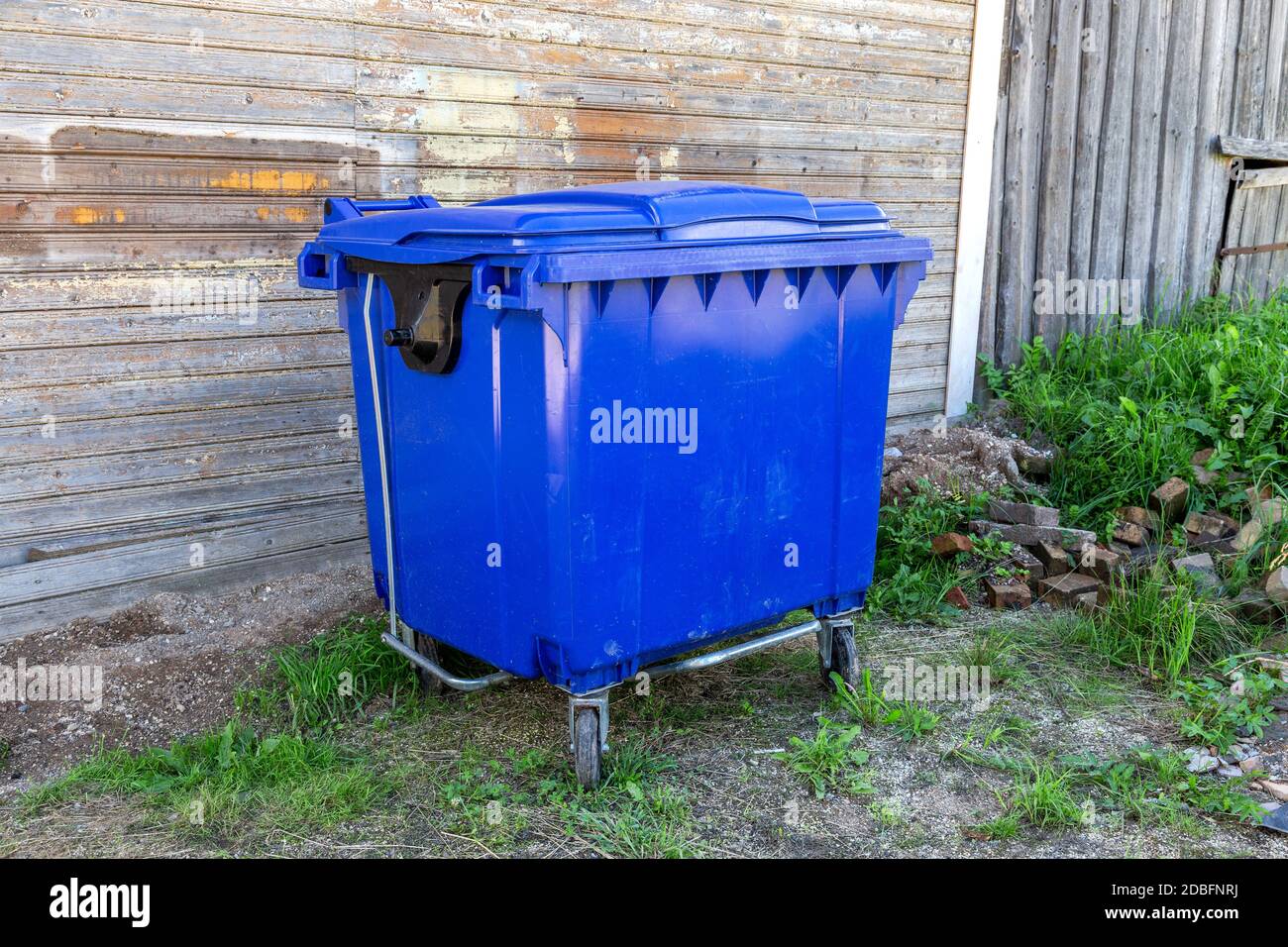 Plastic recycling container for garbage at the outdoors Stock Photo - Alamy