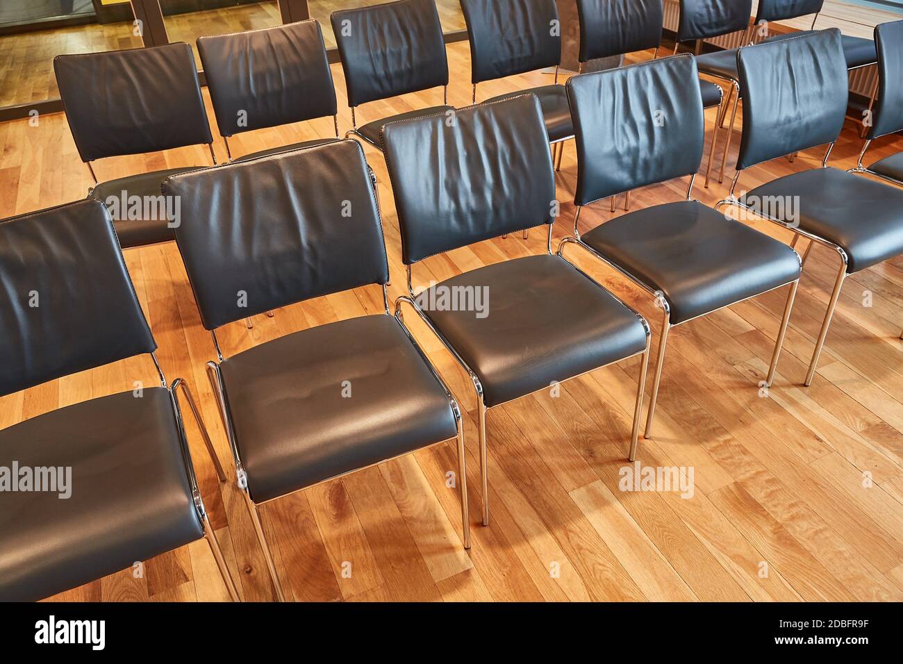 Chairs in rows in a room Stock Photo - Alamy
