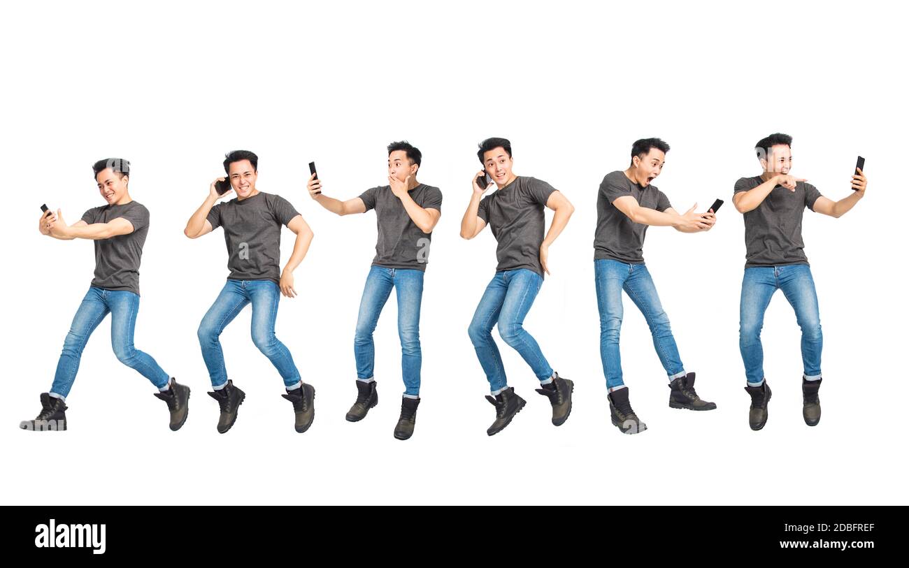 excited young man jumping and using mobile phone concepts Stock Photo ...
