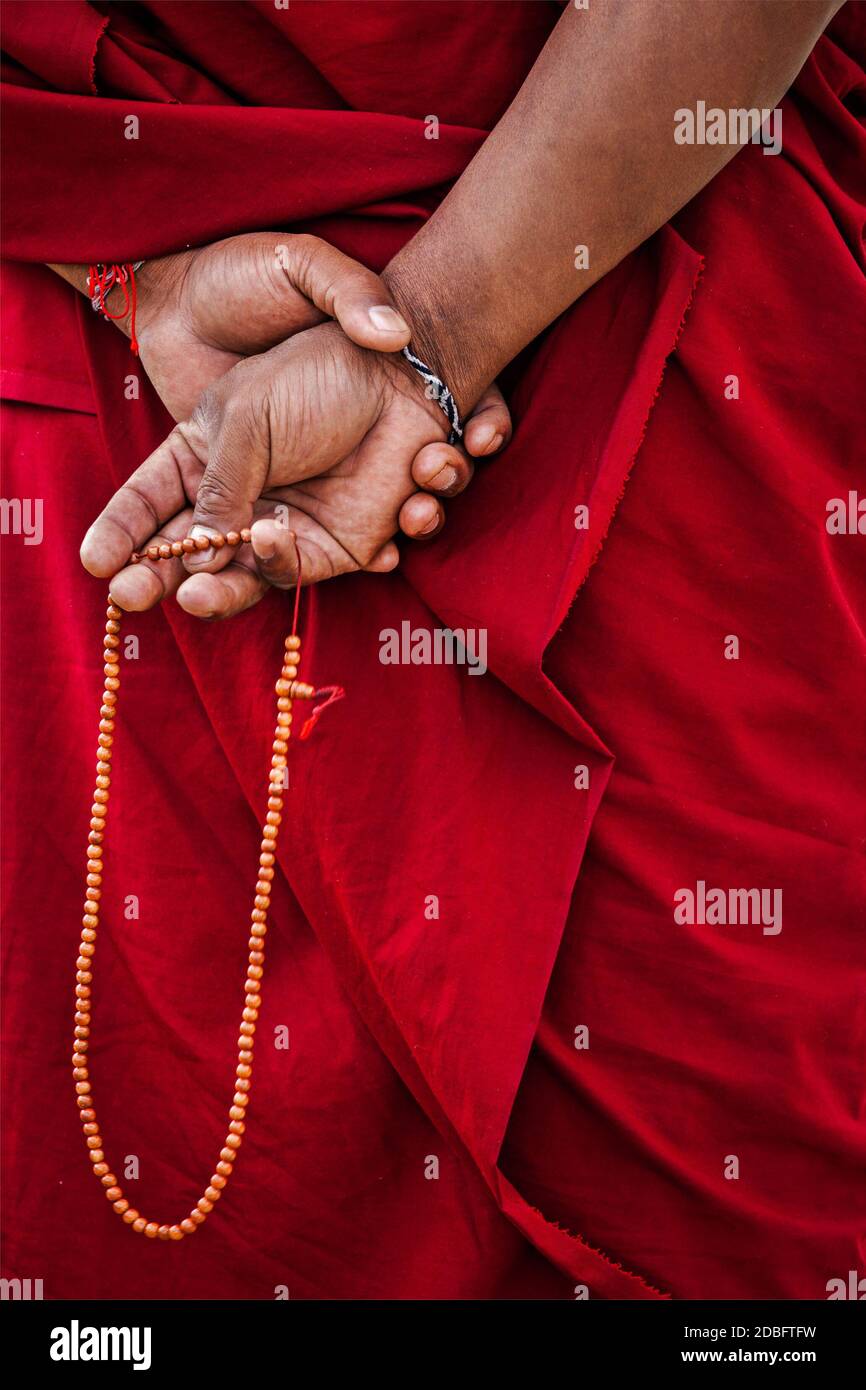 Tibetan Buddhism - prayer beads in Buddhist monk hands. Ladakh, India ...