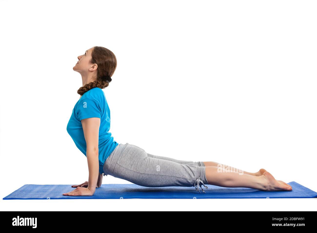 Yoga - young beautiful woman yoga instructor doing Upward Facing Dog ...