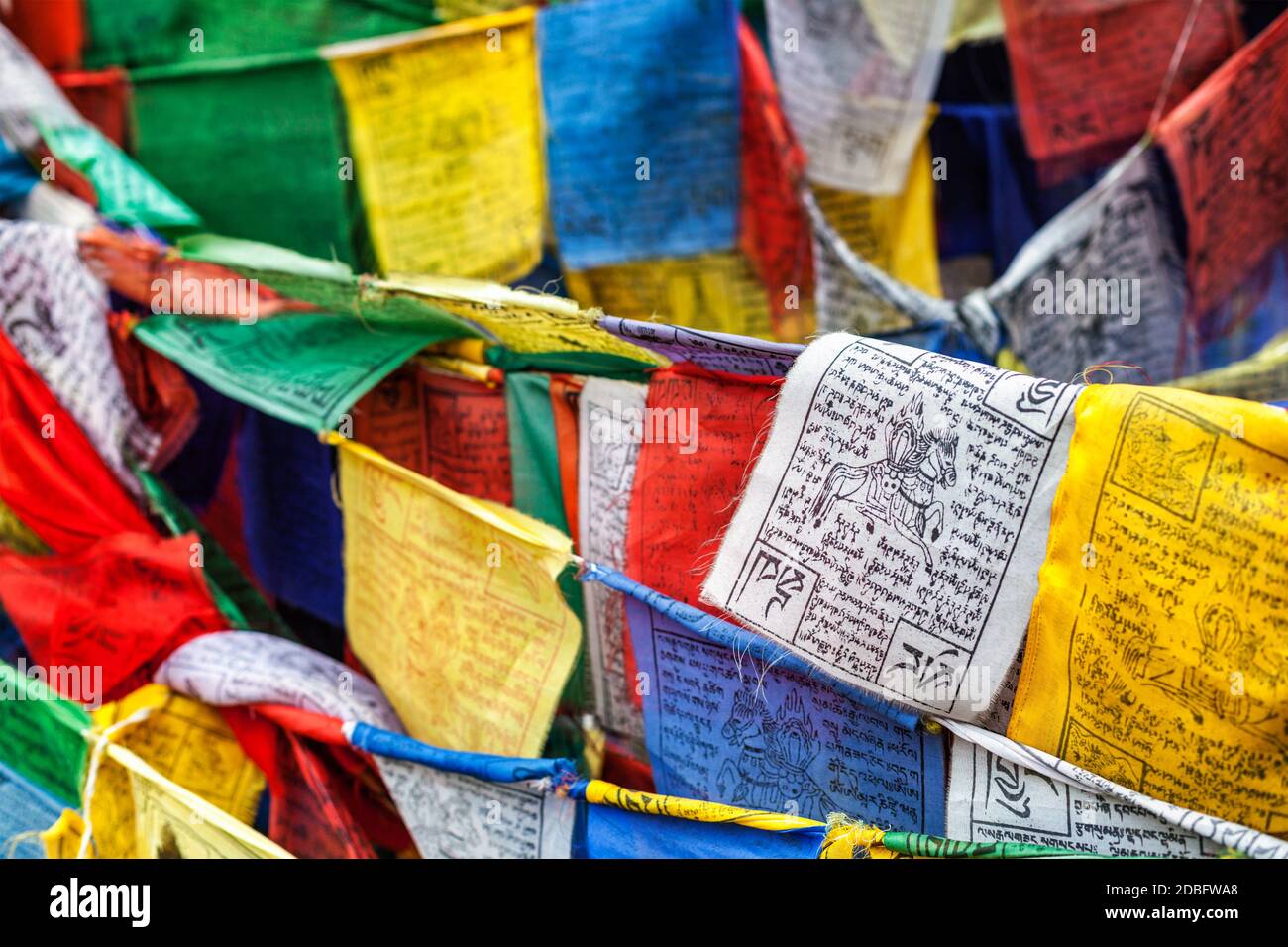 Tibetan Buddhism prayer flags (lungta) with Om Mani Padme Hum Buddhist ...