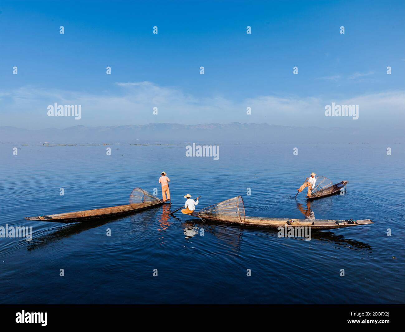 Myanmar travel attraction landmark - Traditional Burmese fishermen with ...