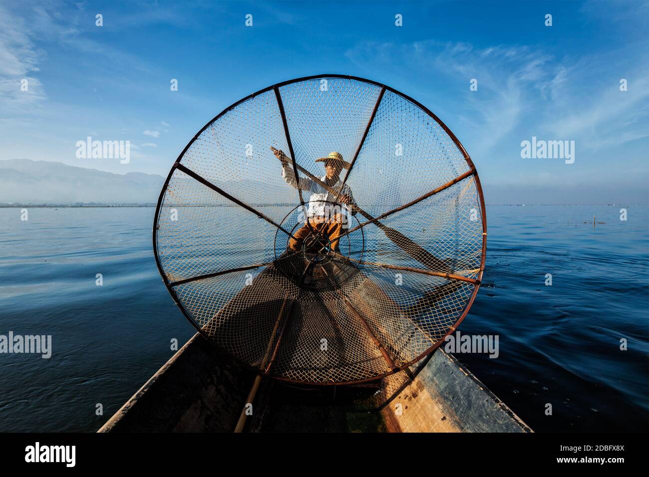 Myanmar travel attraction landmark - Traditional Burmese fisherman with ...
