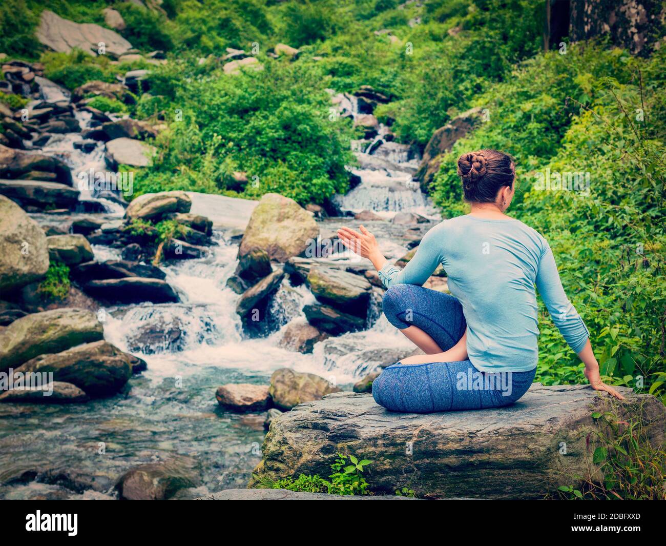 Yoga exercise outdoors - woman doing Ashtanga Vinyasa Yoga asana ...