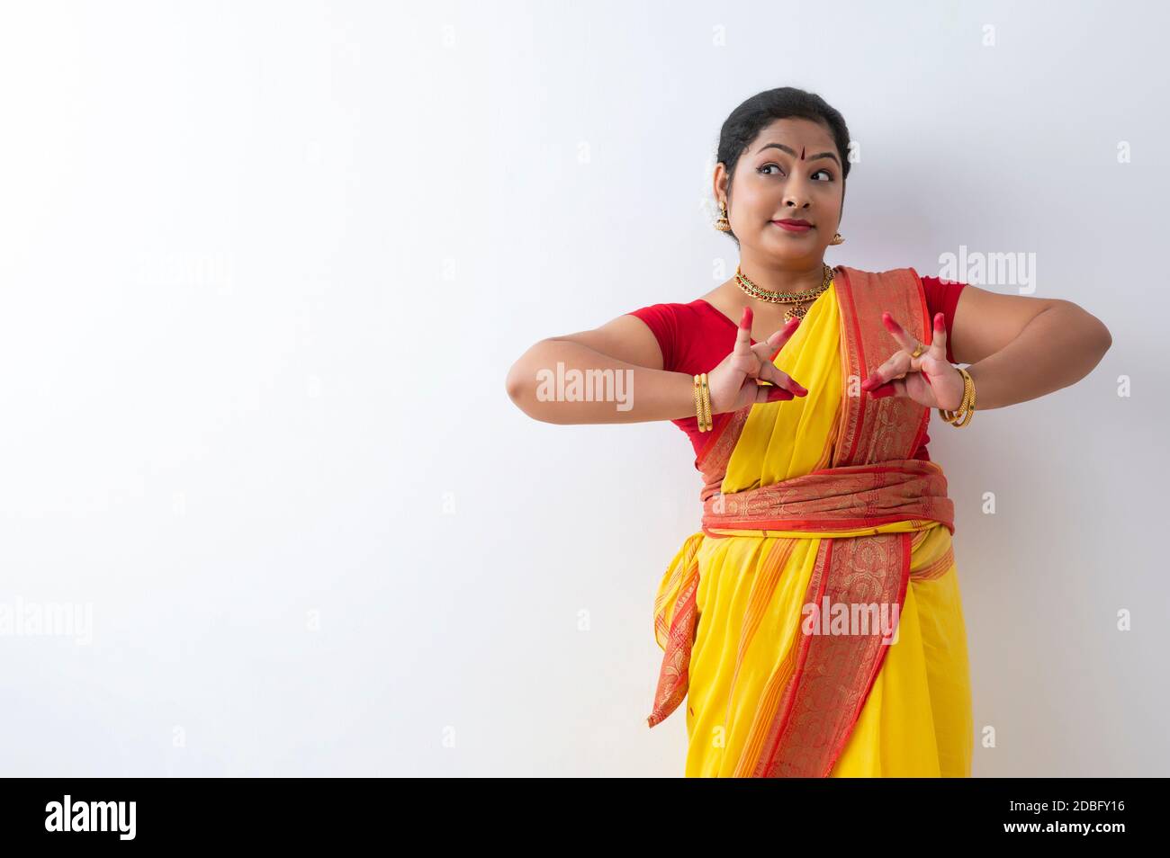 Kuchipudi dancer in Katakavardhanam mudra depicting coronation ceremony ...