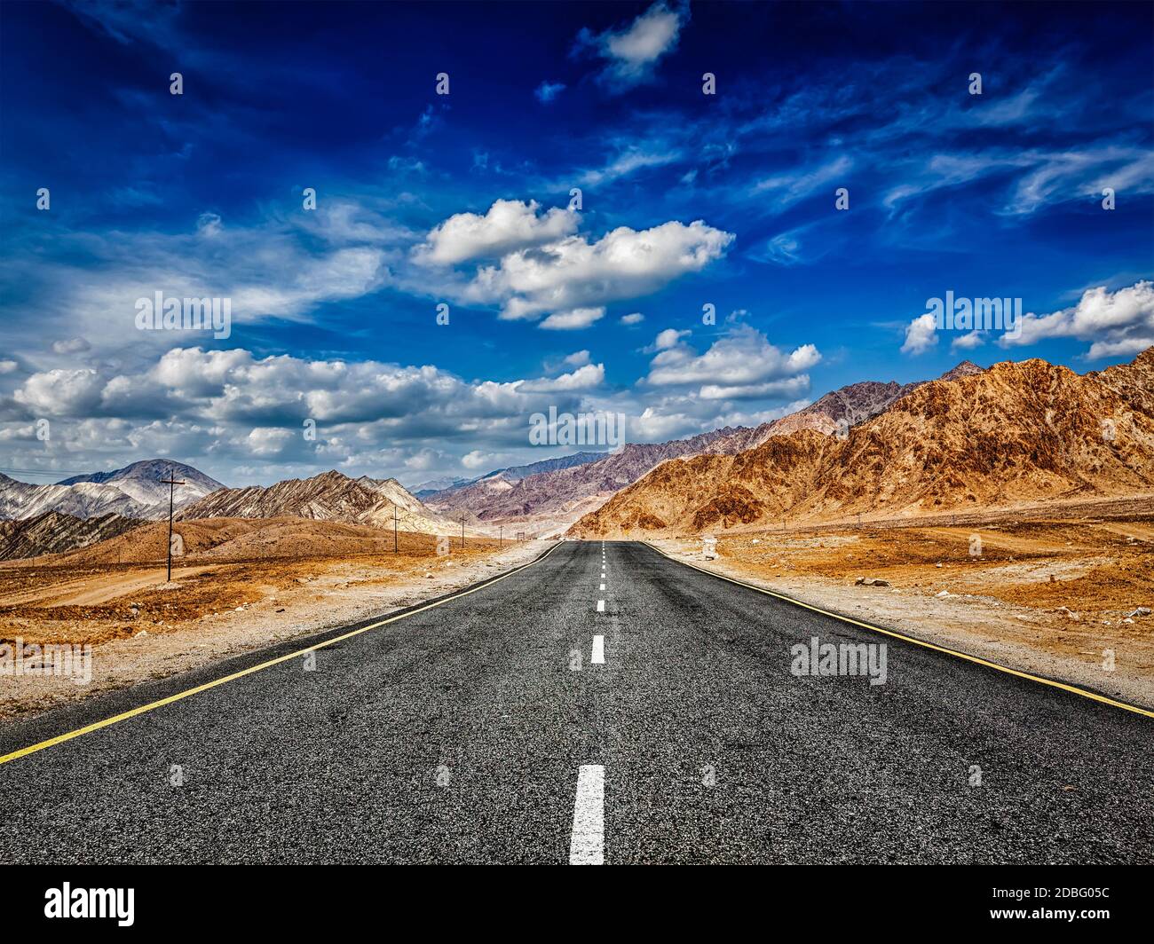 Travel forward journey concept - road in mountains Himalayas and ...