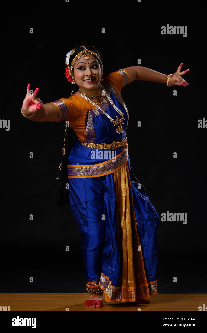 Kuchipudi dancer in Katakamukha mudra representing opening of a ...