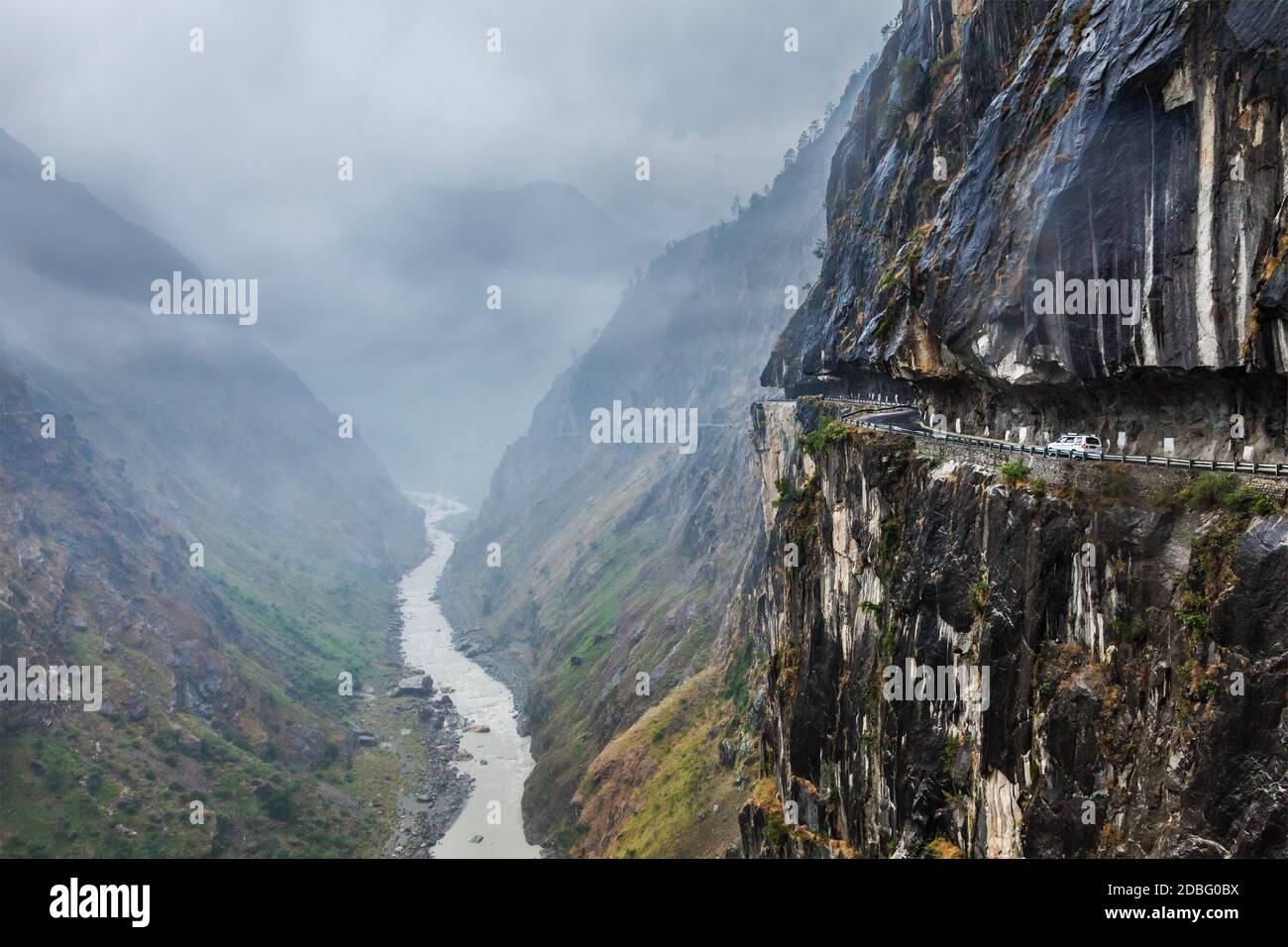 Car on road in Himalayas mountains above precipice Stock Photo - Alamy