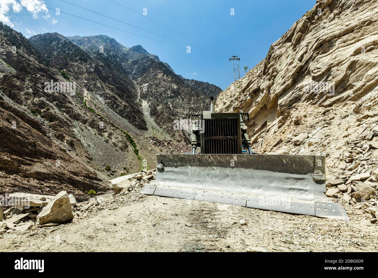 Bulldozer doing mountain road construction in Himalayas. Himachal ...