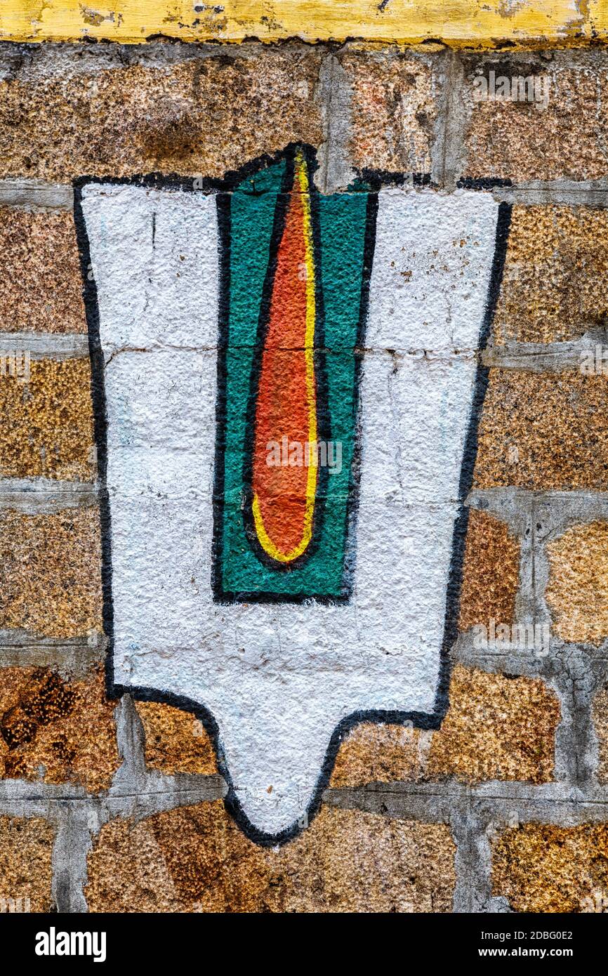 Spiritual Indian God Tilak Sign Vushnu symbol on Hindu temple wall. Sri ...