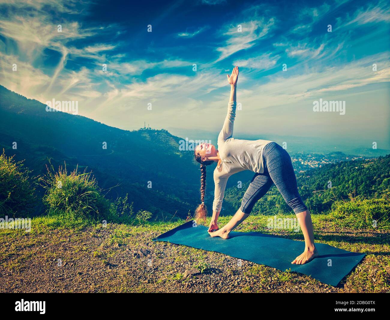 Vintage retro effect hipster style image of woman doing Ashtanga ...