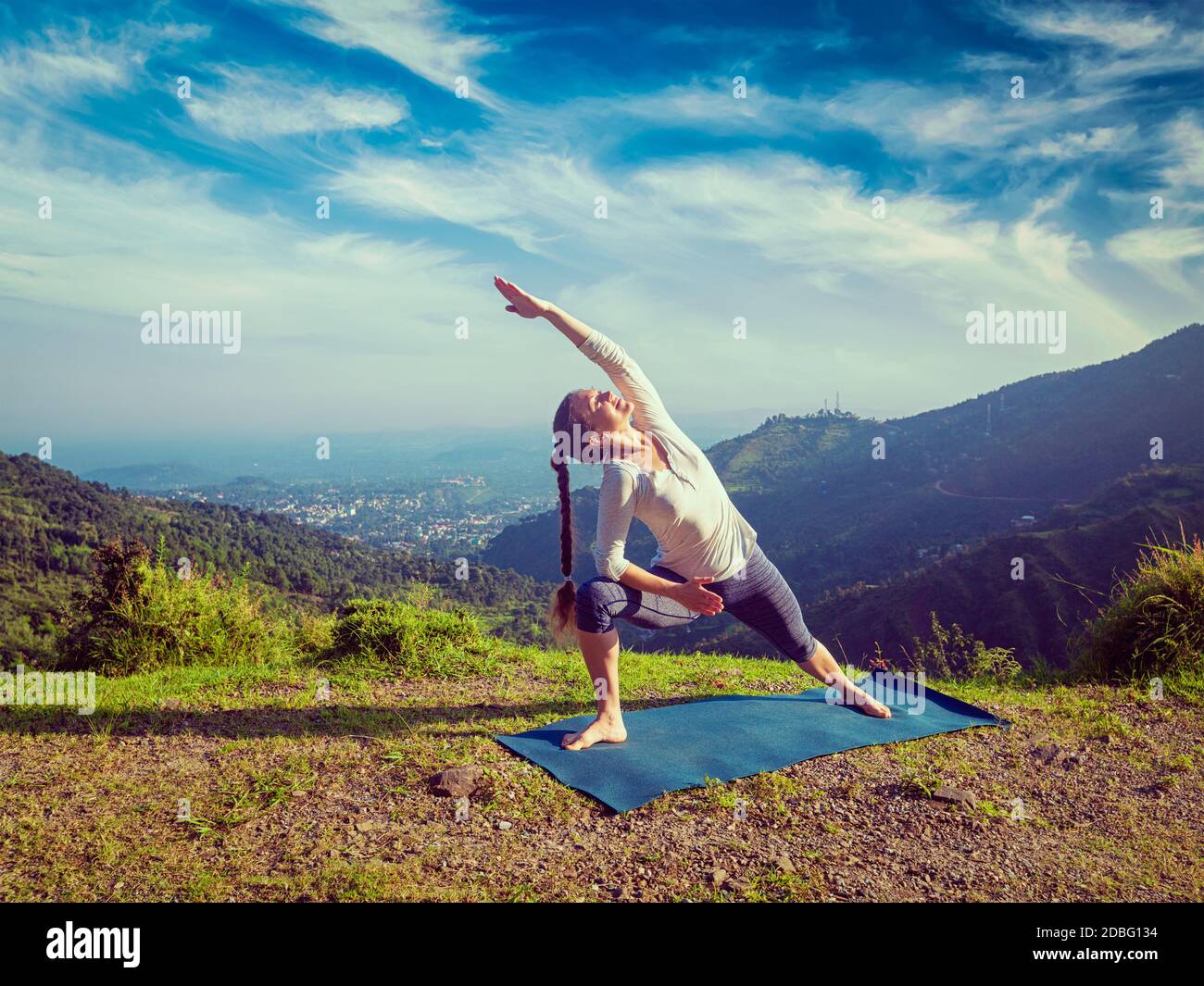 Vintage retro effect hipster style image of sporty fit woman practices ...