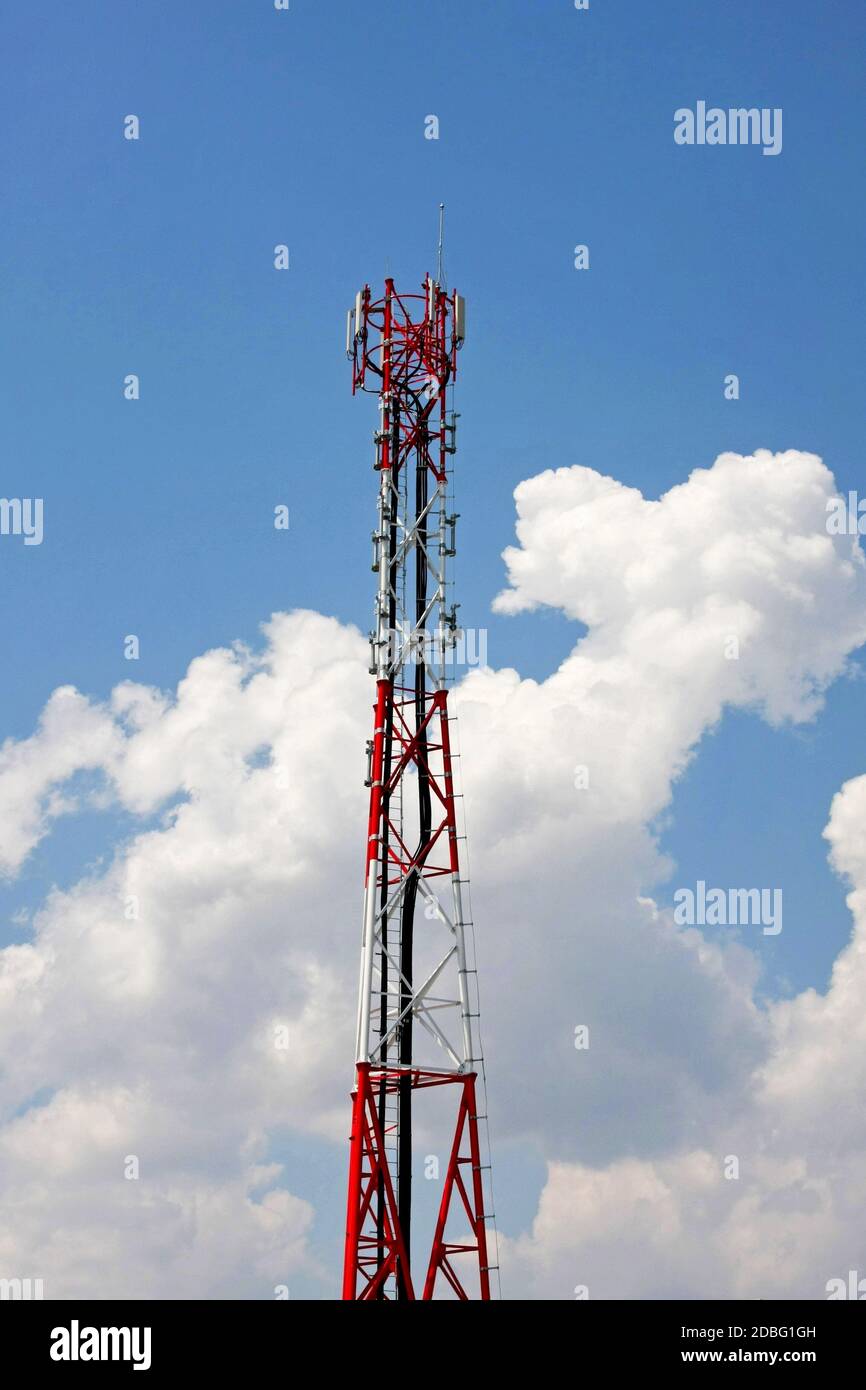 Red tall antenna tower for cellular communication Stock Photo - Alamy