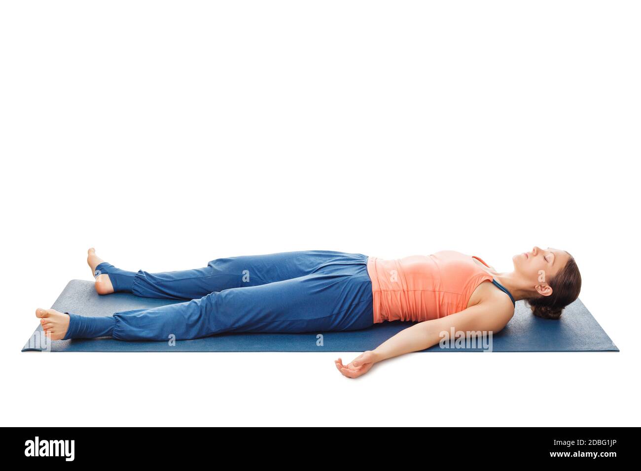 Woman relaxes in yoga asana Savasana - corpse pose isolated on white ...