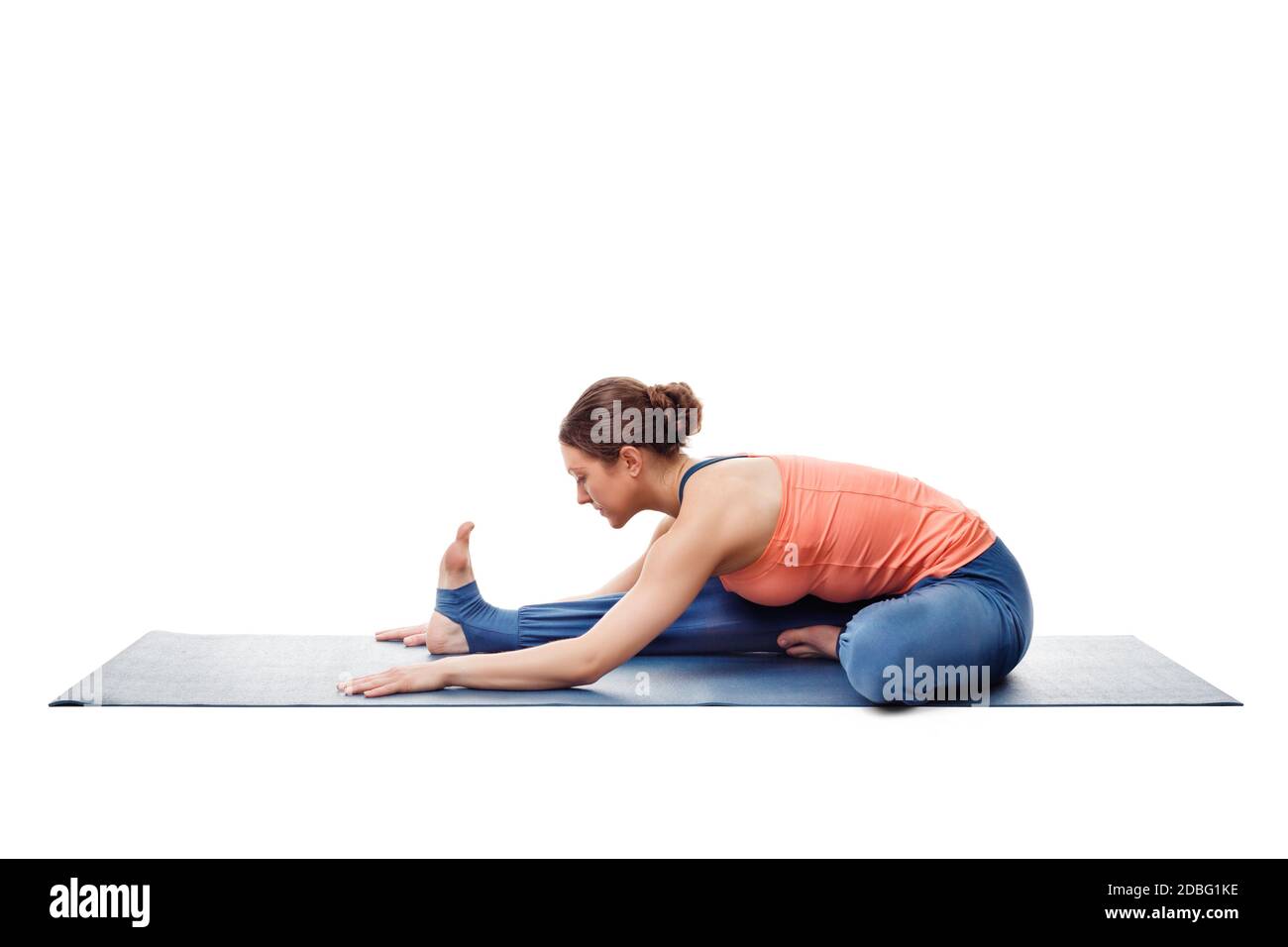 Young beautiful sporty fit woman doing Ashtanga Vinyasa Yoga asana Janu ...