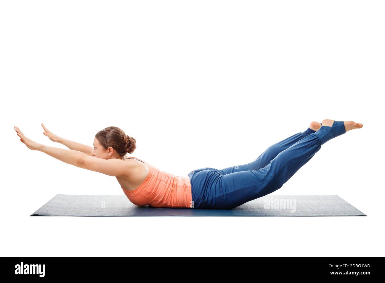 Woman doing Ashtanga Vinyasa Yoga asana Salabhasana A - locust pose A ...