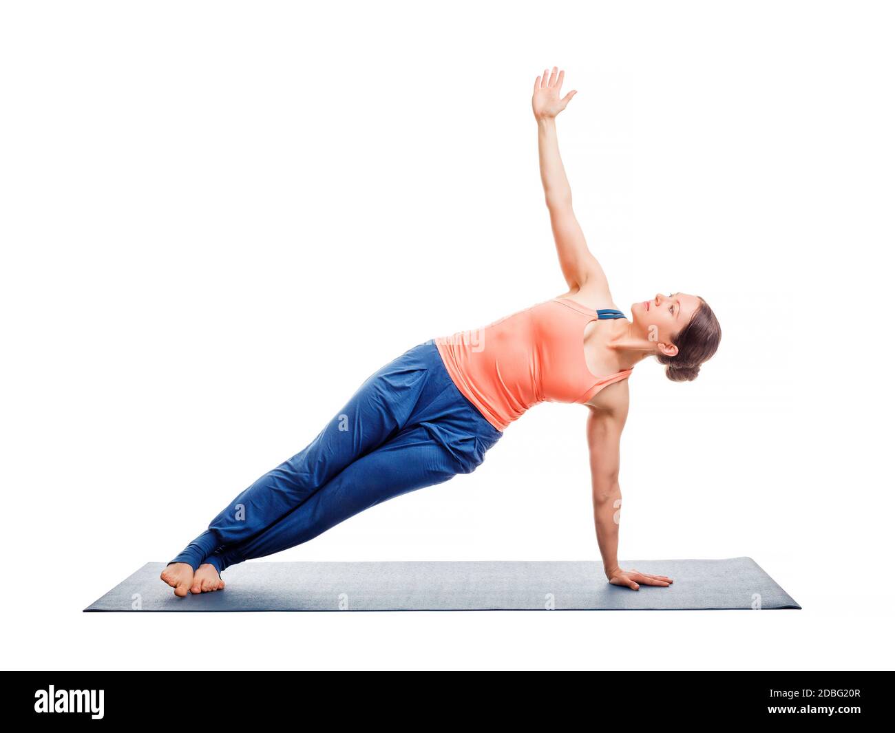 Beautiful sporty fit woman practices yoga asana Vasisthasana - side ...