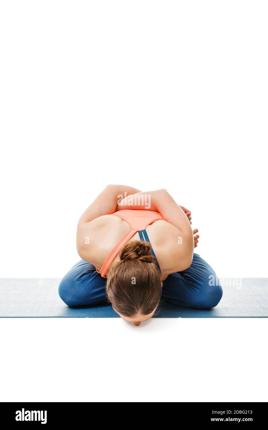 Woman doing Asthanga Vinyasa Yoga asana Yoga mudrasana (yoga mudra ...