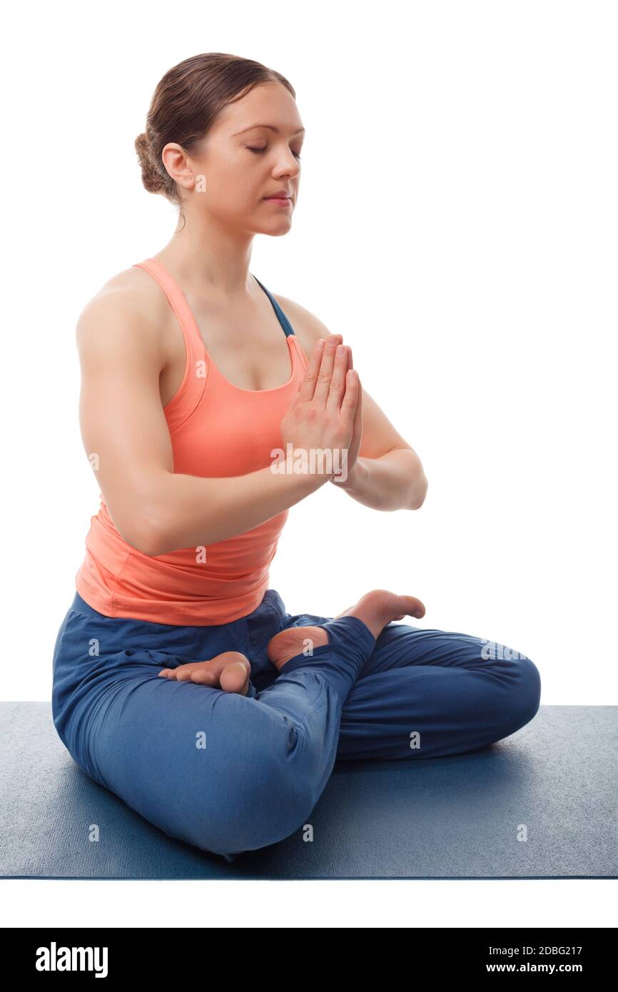 Beautiful sporty fit yogini woman meditates in yoga asana Padmasana ...