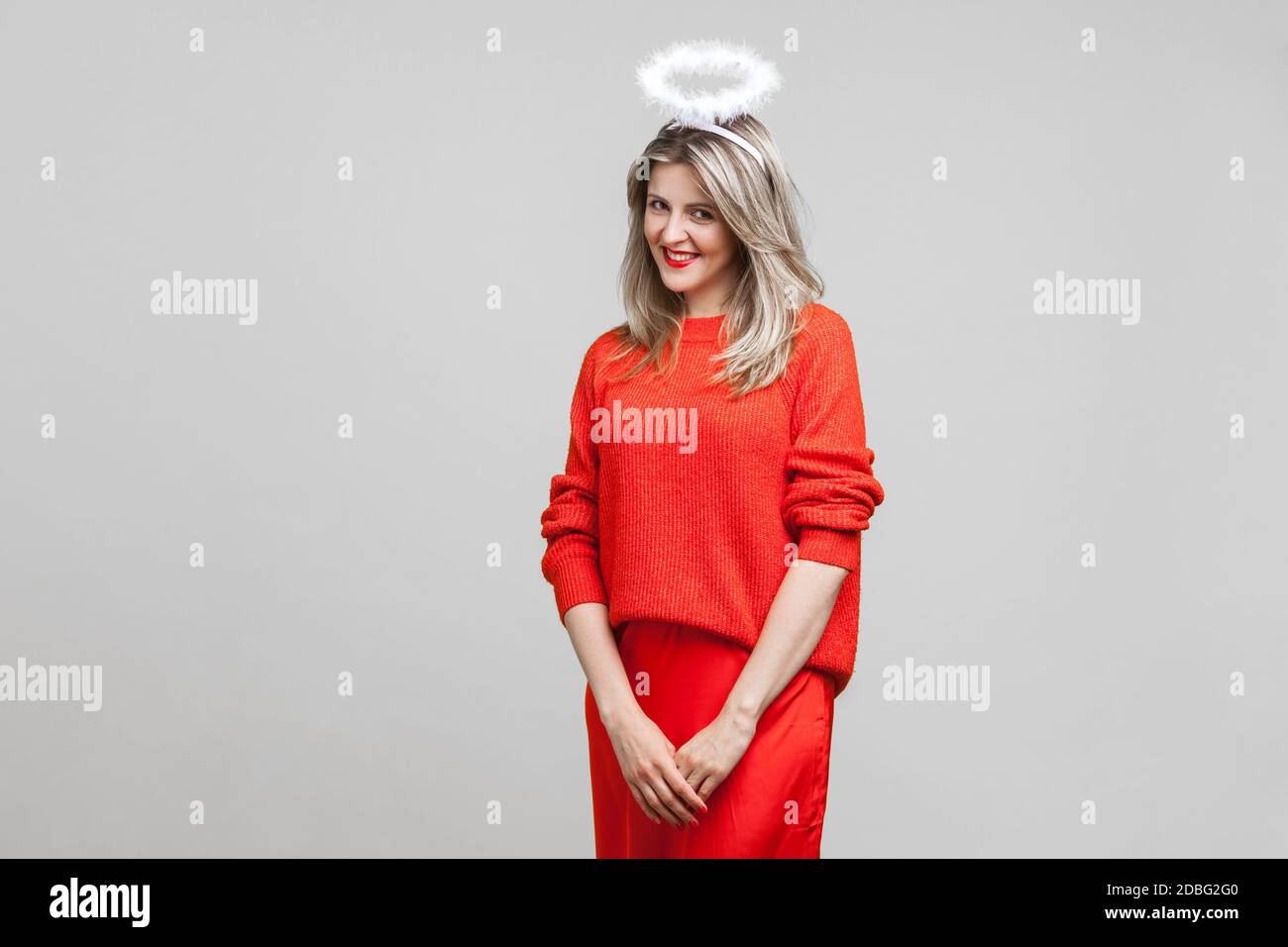 Portrait of modest angel beautiful young woman with bright makeup in ...