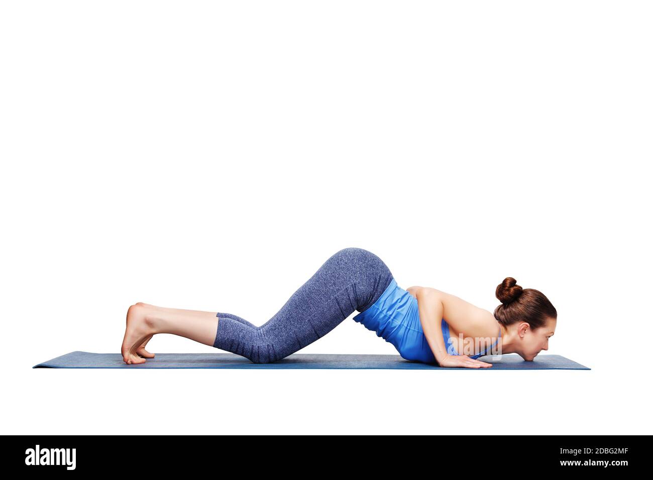 Beautiful sporty fit woman practices yoga asana Ashtangasana - eight ...