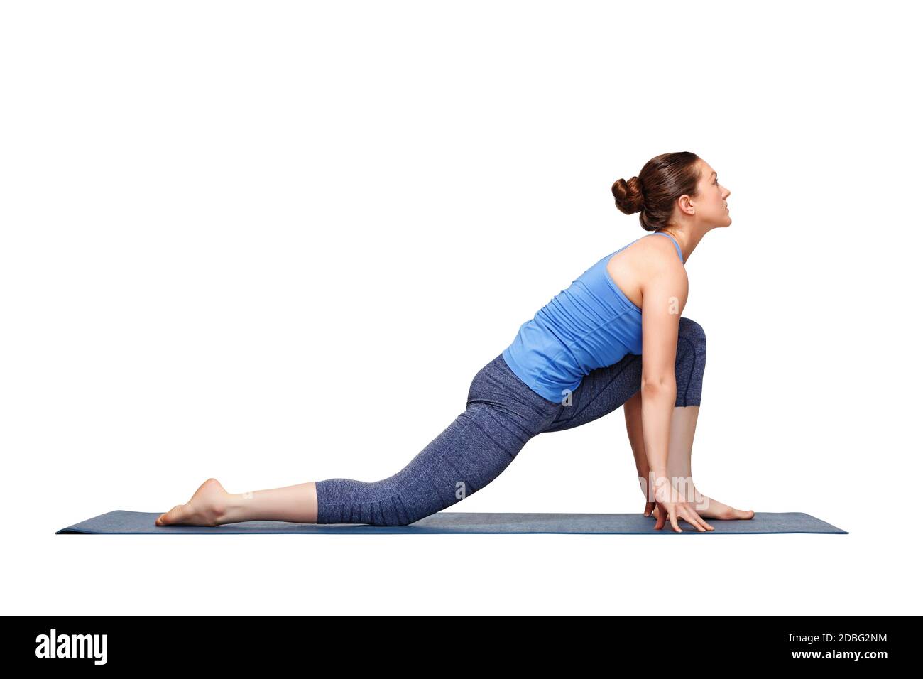 Beautiful sporty fit yogini woman practices yoga asana Anjaneyasana ...