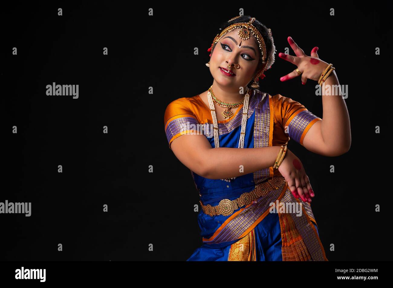 Indian classical dancer performing on stage Stock Photo - Alamy