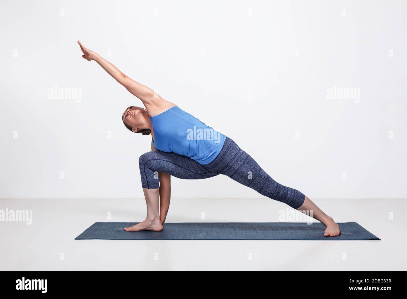 Young Fit Woman Doing Ashtanga Vinyasa Yoga Asana Utthita