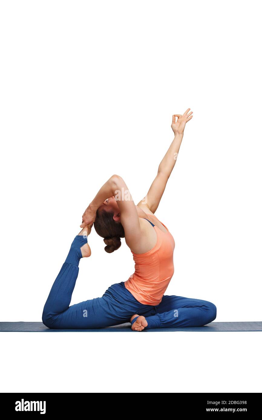 Woman doing Hatha yoga asana Eka pada rajakapotasana - one-legged king pigeon pose isolated ...