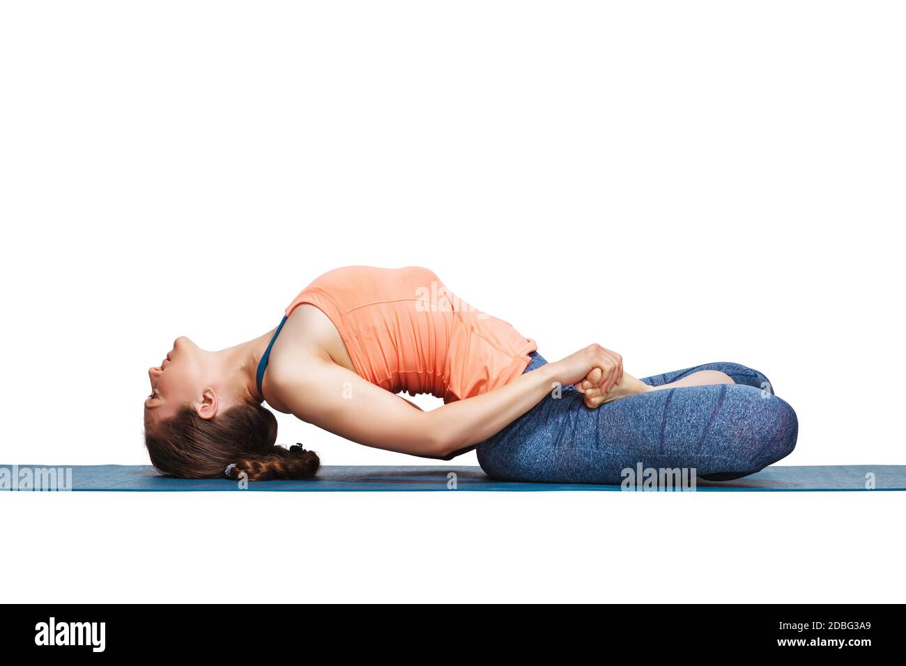 Beautiful sporty fit yogini woman practices yoga asana Matsyasana ...
