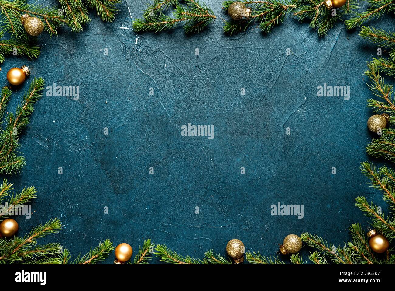 Christmas frame made of christmas fir tree and decorations on mint ...
