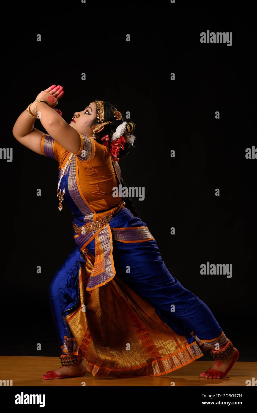 Kuchipudi dancer doing Namaskaram on stage in Anjali mudra Stock Photo ...