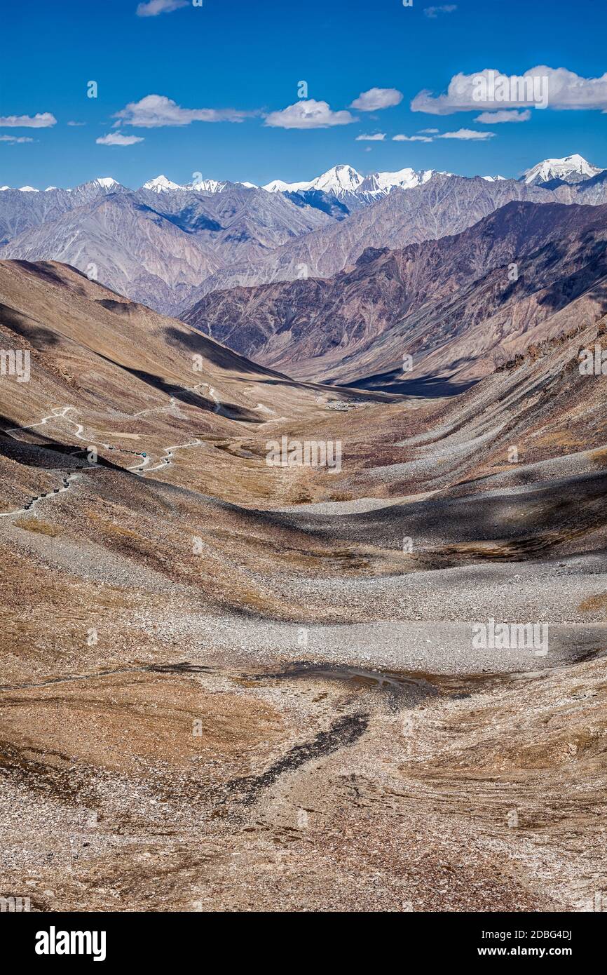 View of Karakorum range and road in valley from Kardung La - the ...