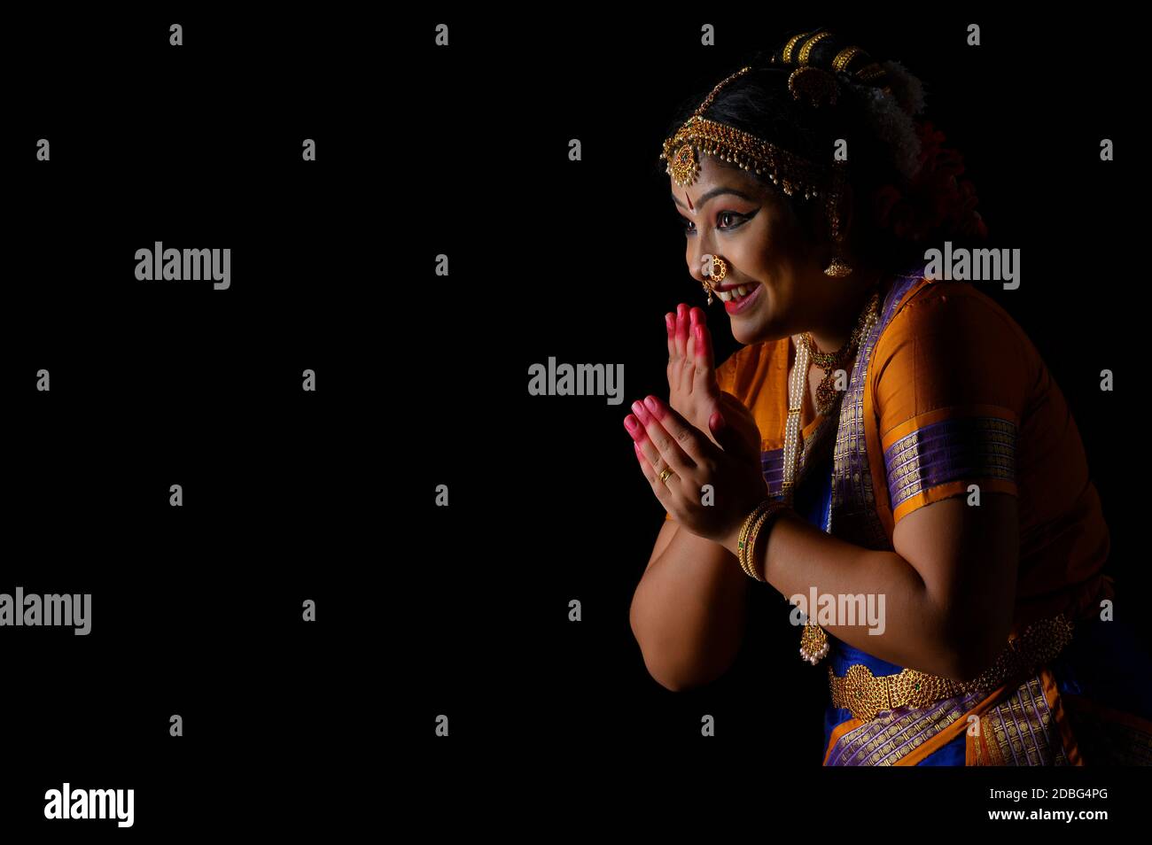 Kuchipudi dancer expressing through Hasya rasa Stock Photo - Alamy