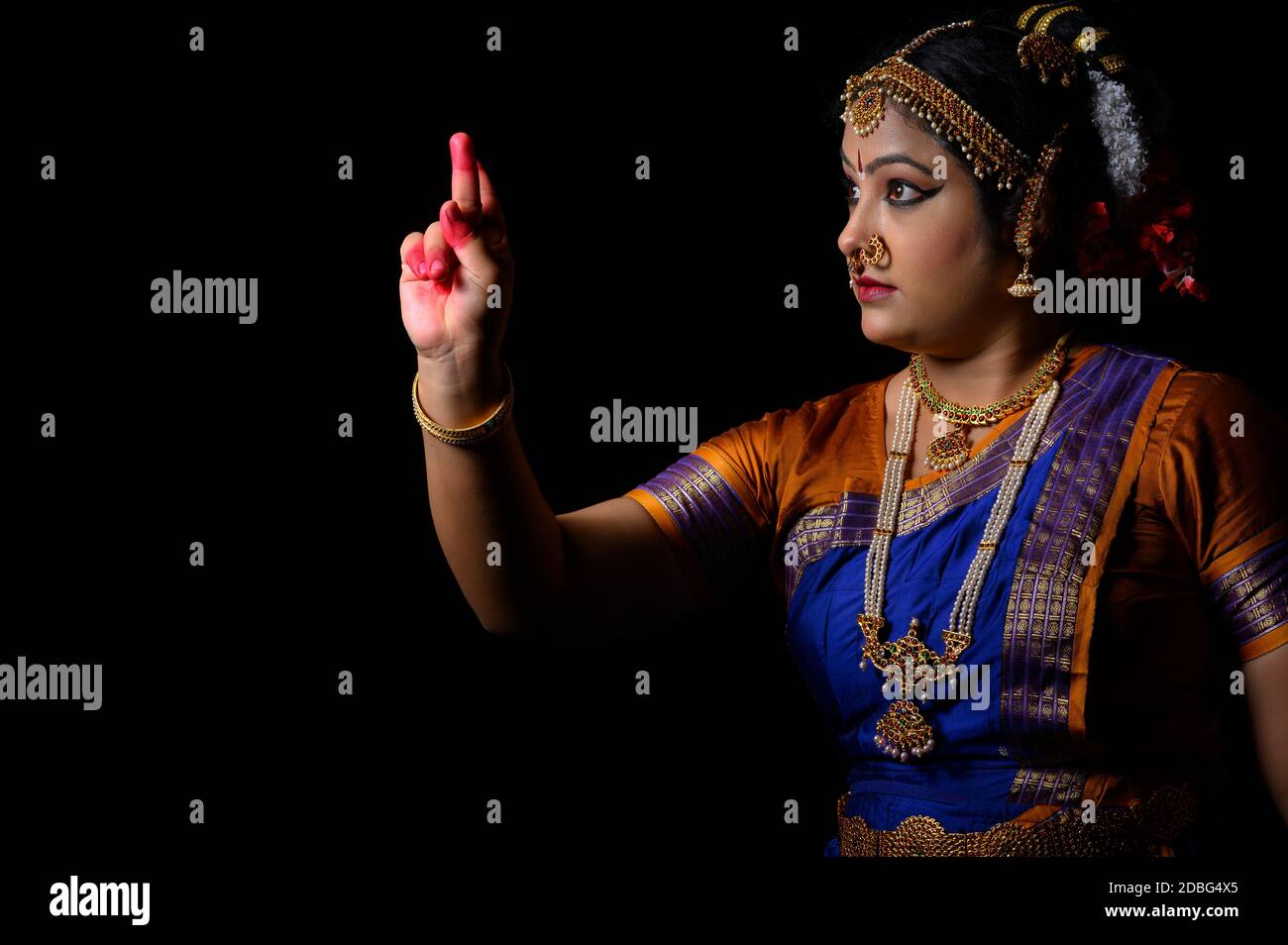Kuchipudi dancer showing Raudra Rasa in her performance Stock Photo - Alamy
