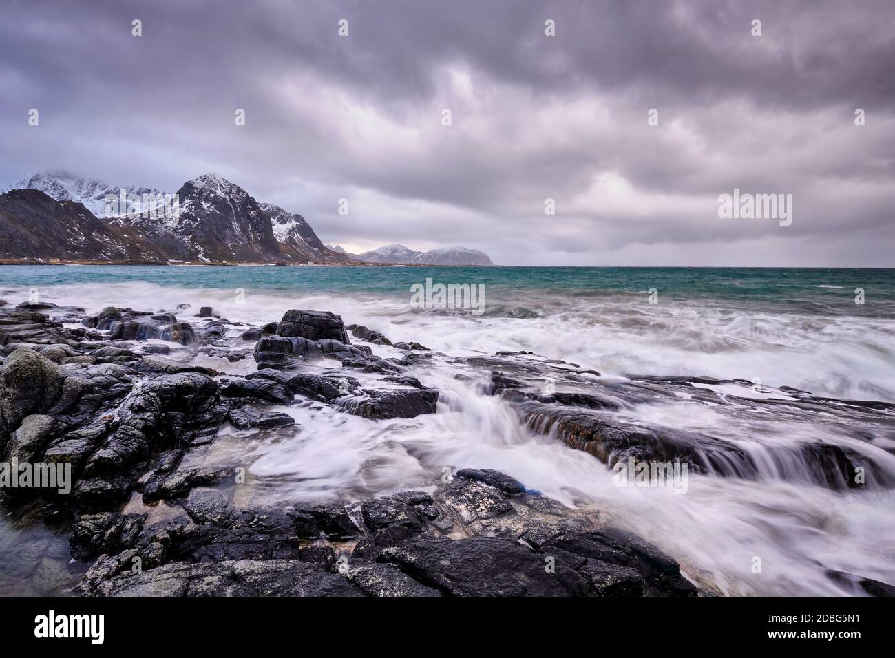 Rocky coast of fjord of Norwegian sea in winter. Vareid, Lofoten ...