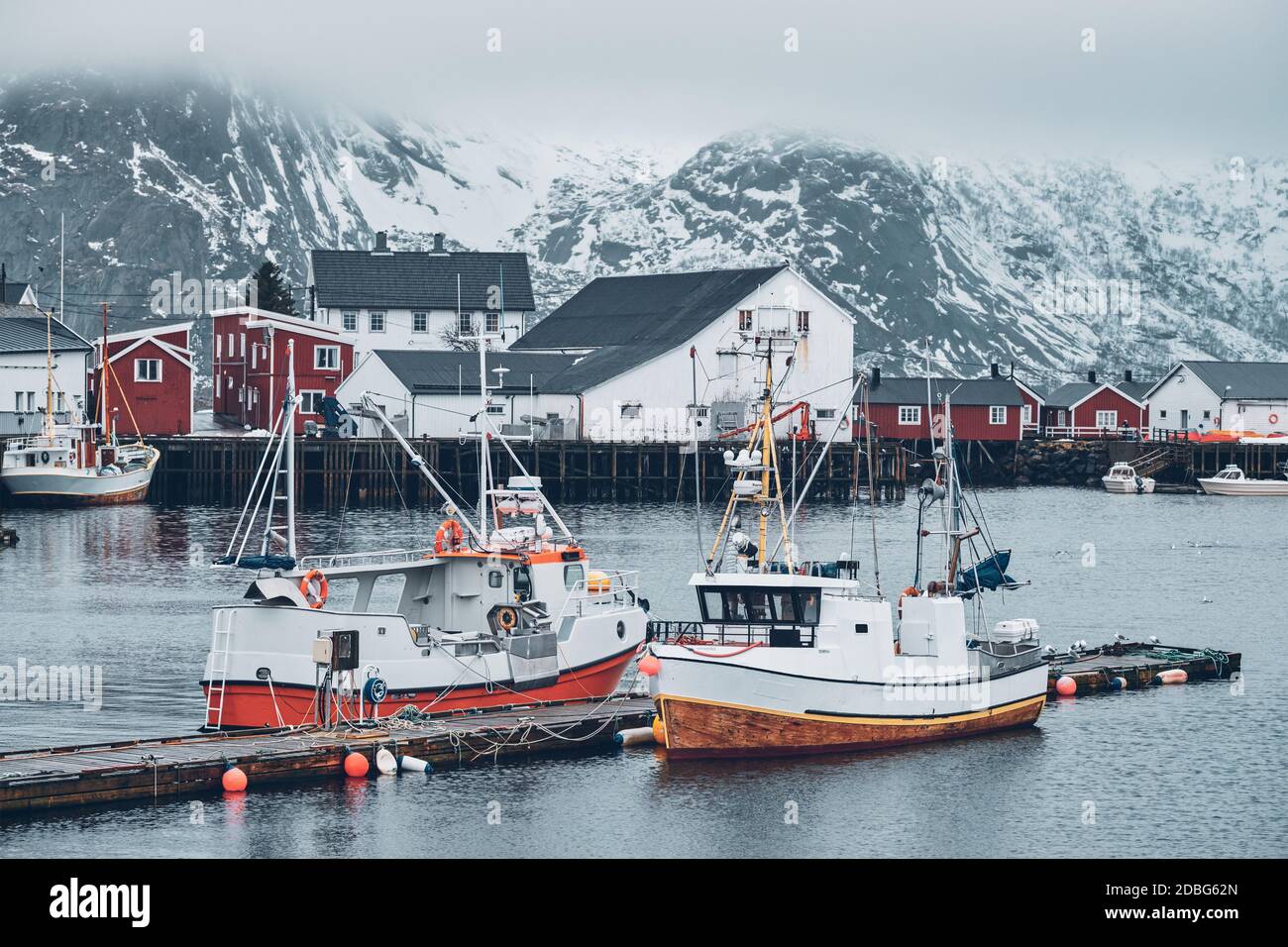 Pier with ships in Hamnoy fishing village on Lofoten Islands, Norway ...