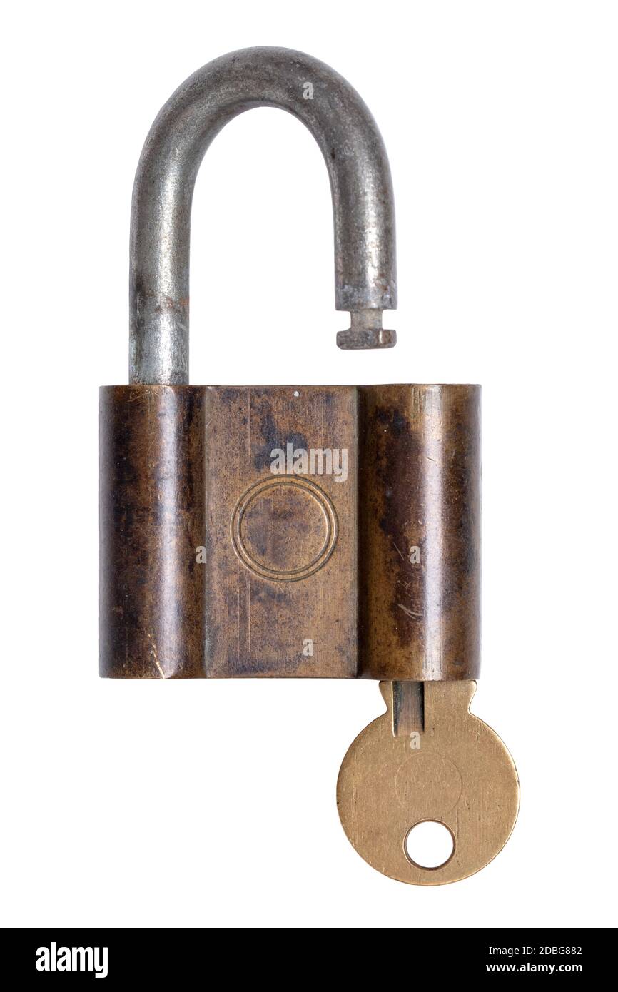 Lock and keys. Closeup of a old opened brass padlock with key inside ...