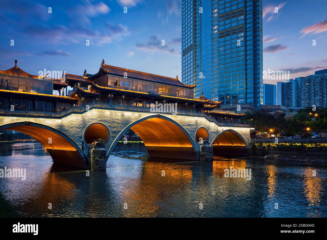 Famous landmark of Chengdu - Anshun bridge over Jin River illuminated ...