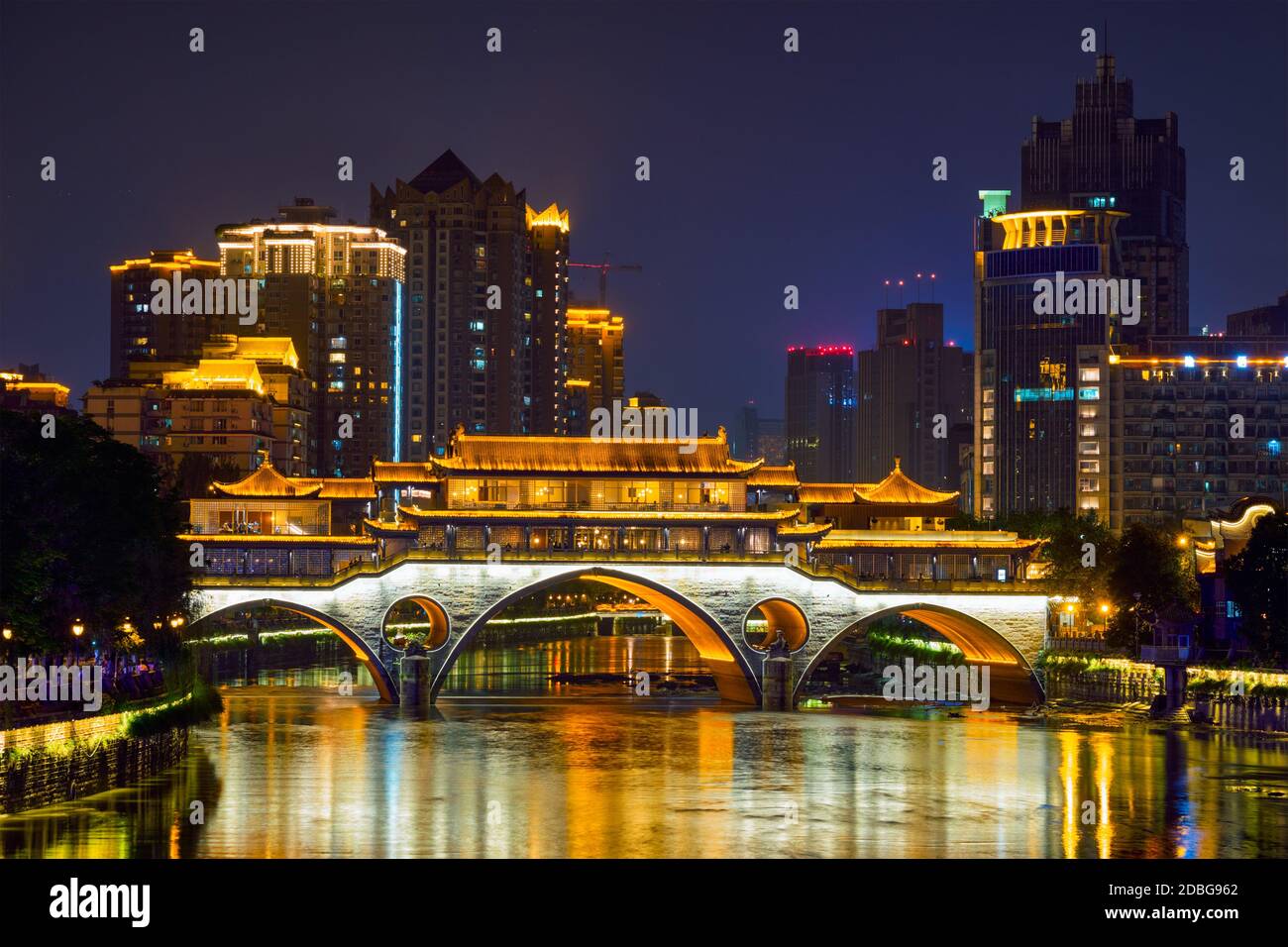 Famous landmark of Chengdu - Anshun bridge over Jin River illuminated ...