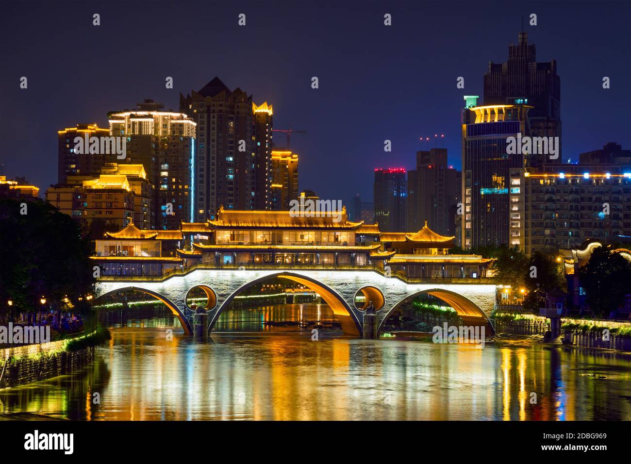 Famous landmark of Chengdu - Anshun bridge over Jin River illuminated ...
