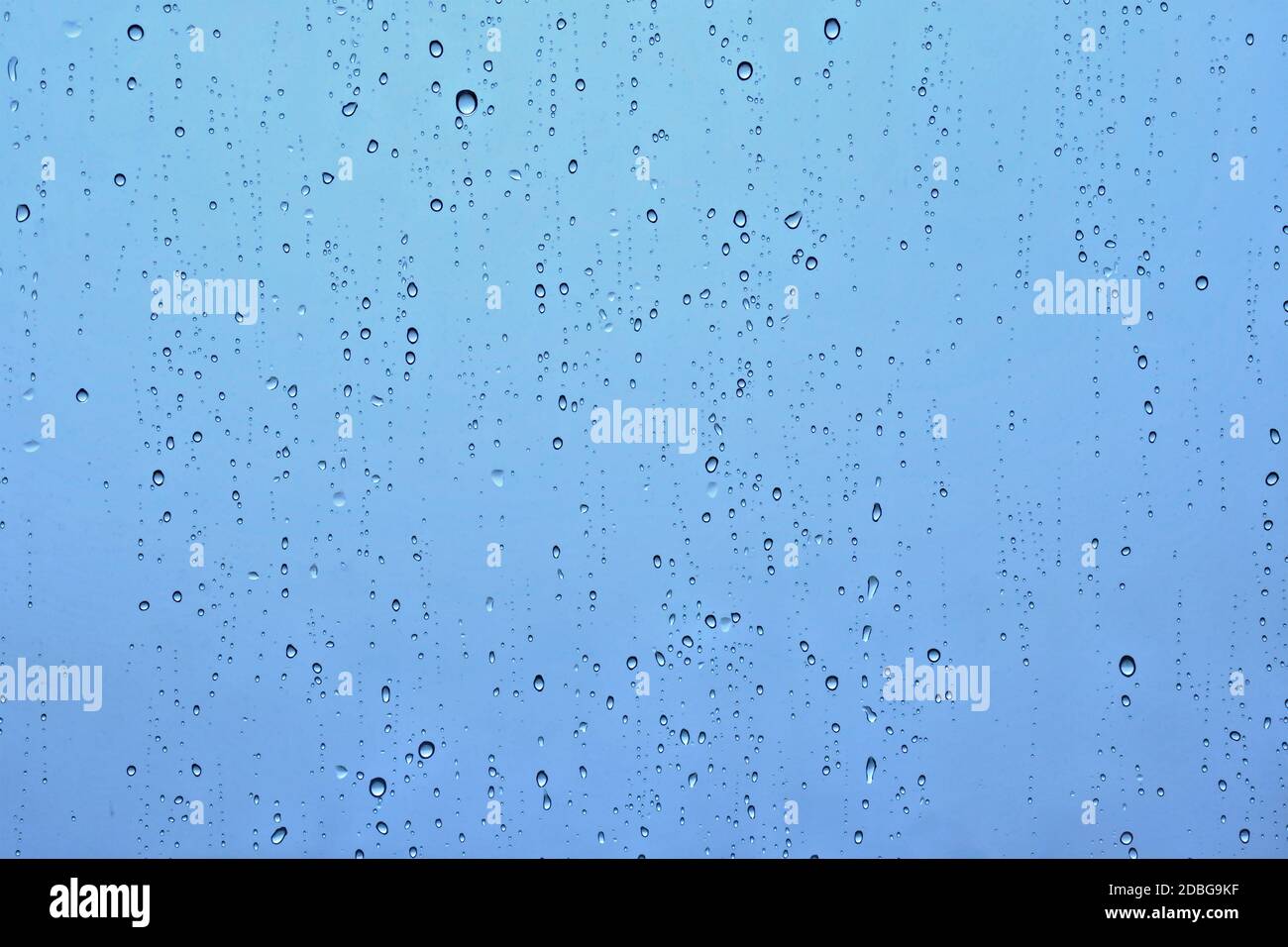 Rain water drops droplets on window glass texture background Stock ...