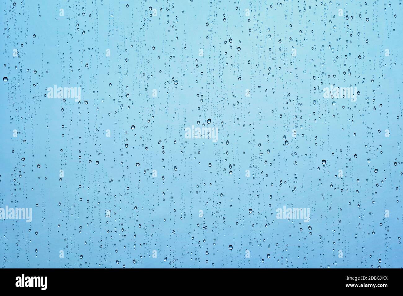 Rain water drops droplets on window glass texture background Stock ...