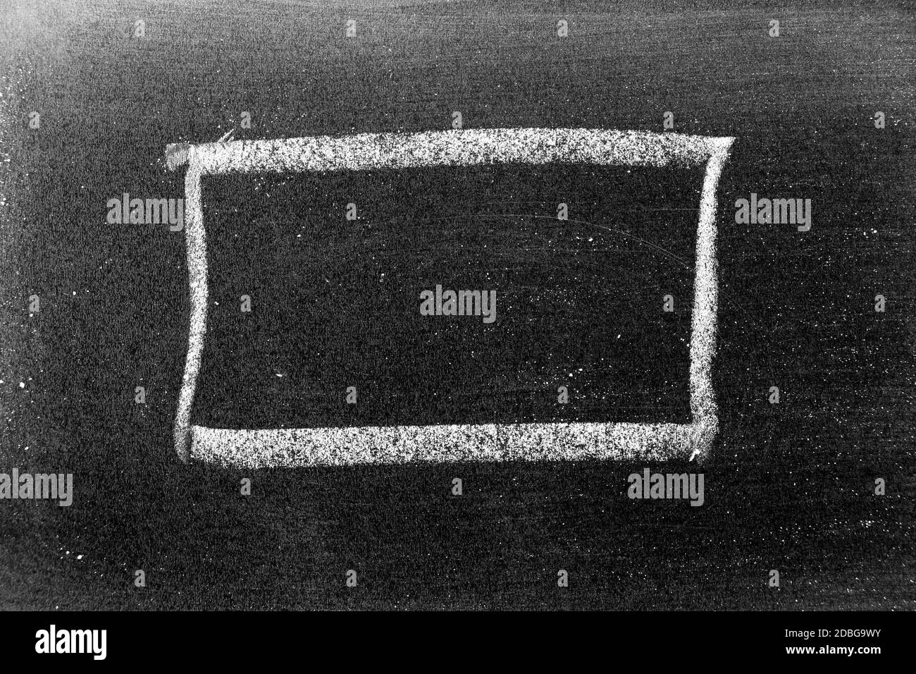 White chalk hand drawing in square or banner shape on black board ...