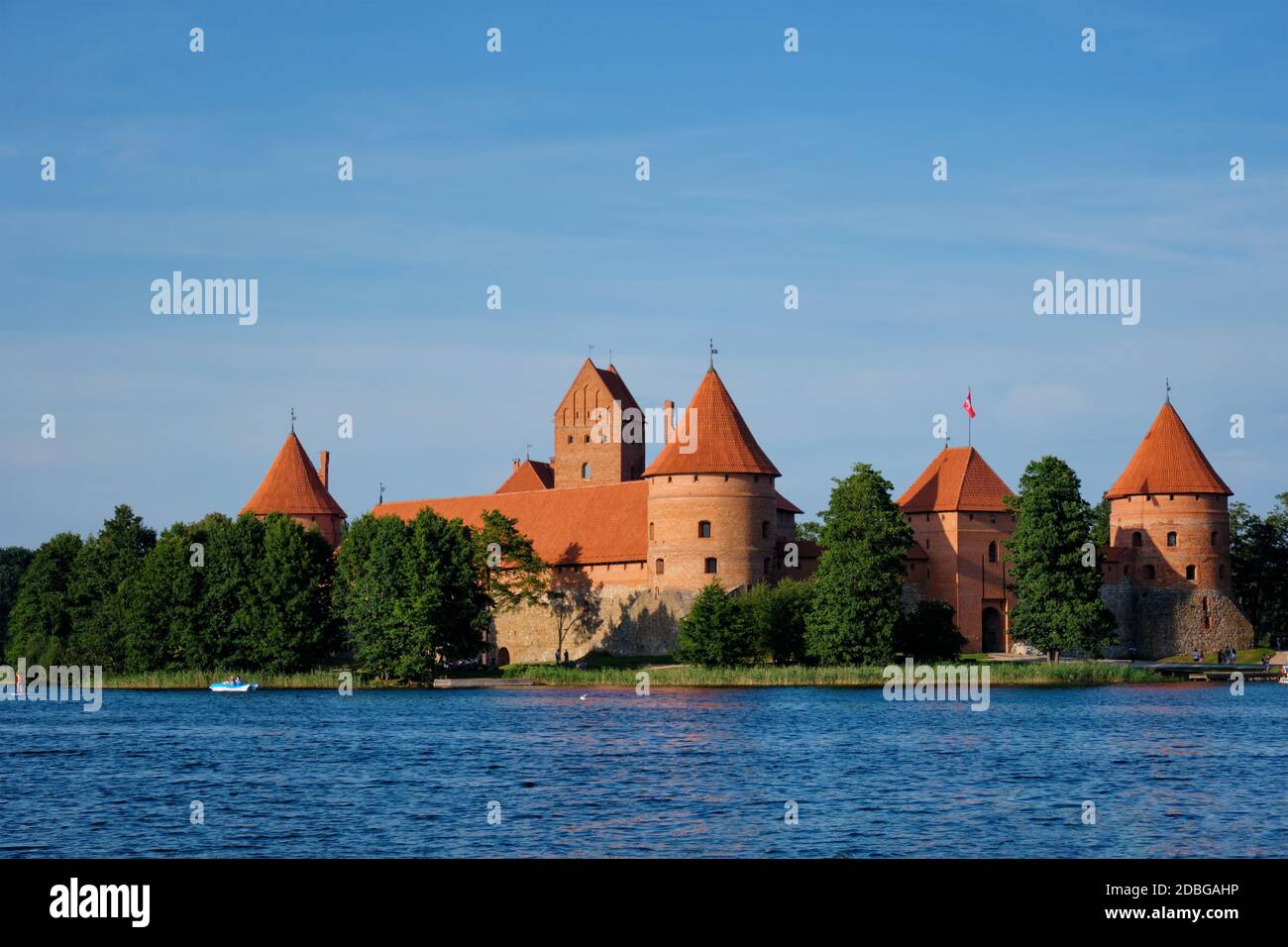 Trakai Island Castle in lake Galve with boats in summer day, Lithuania ...