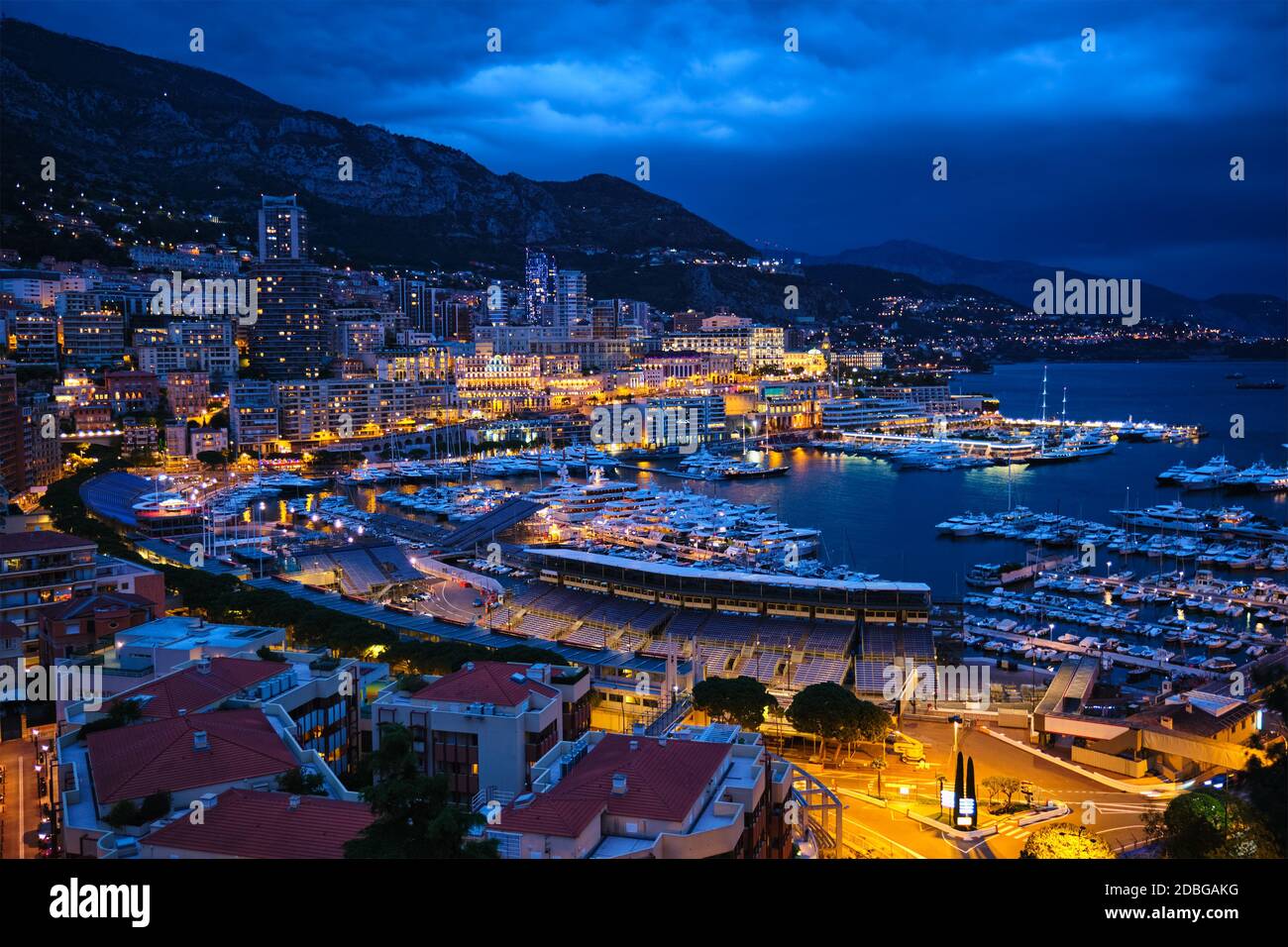 Aerial view of Monaco Monte Carlo harbour and illuminated city skyline ...